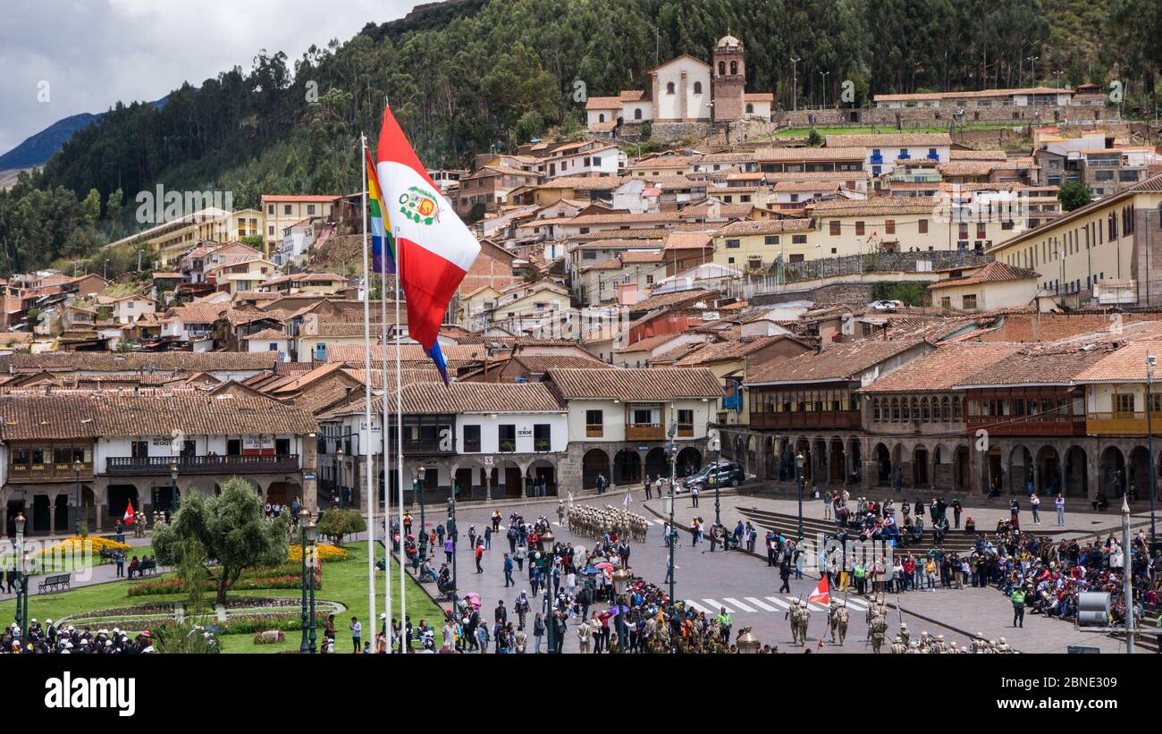 Peruvian national flag next to the rainbow lgtb flag in front of a ...
