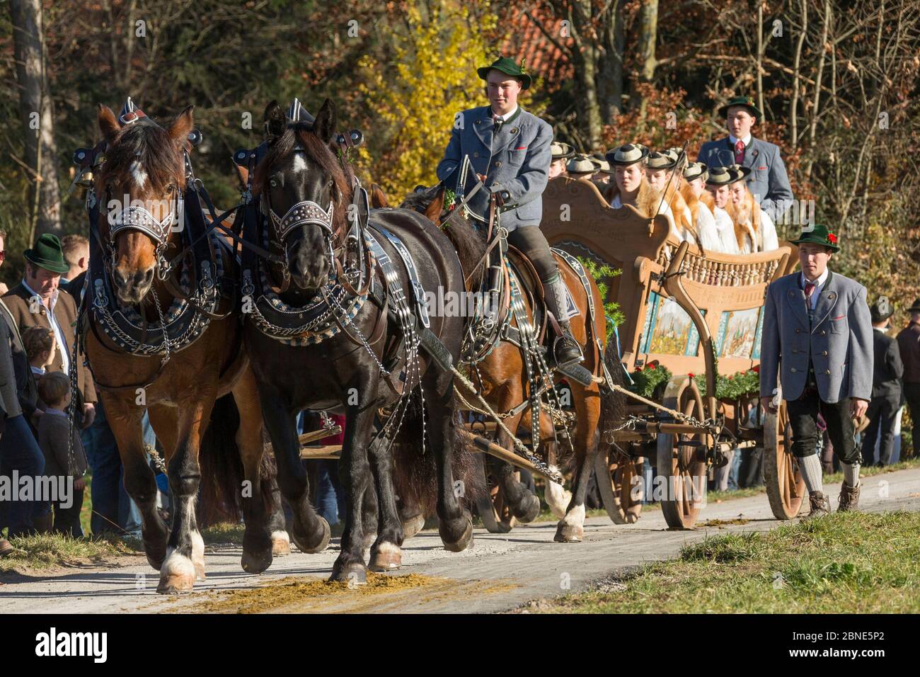 Carriage pulled by four horses parading during the Leonhardiritt or ...
