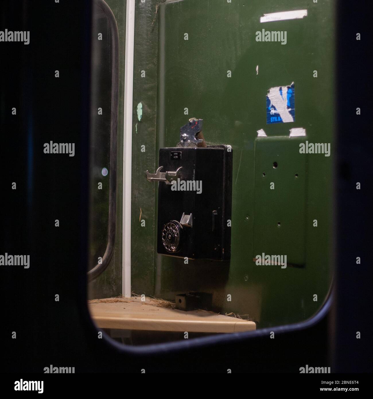 Beautiful shot of an old phone inside the phone booth Stock Photo - Alamy