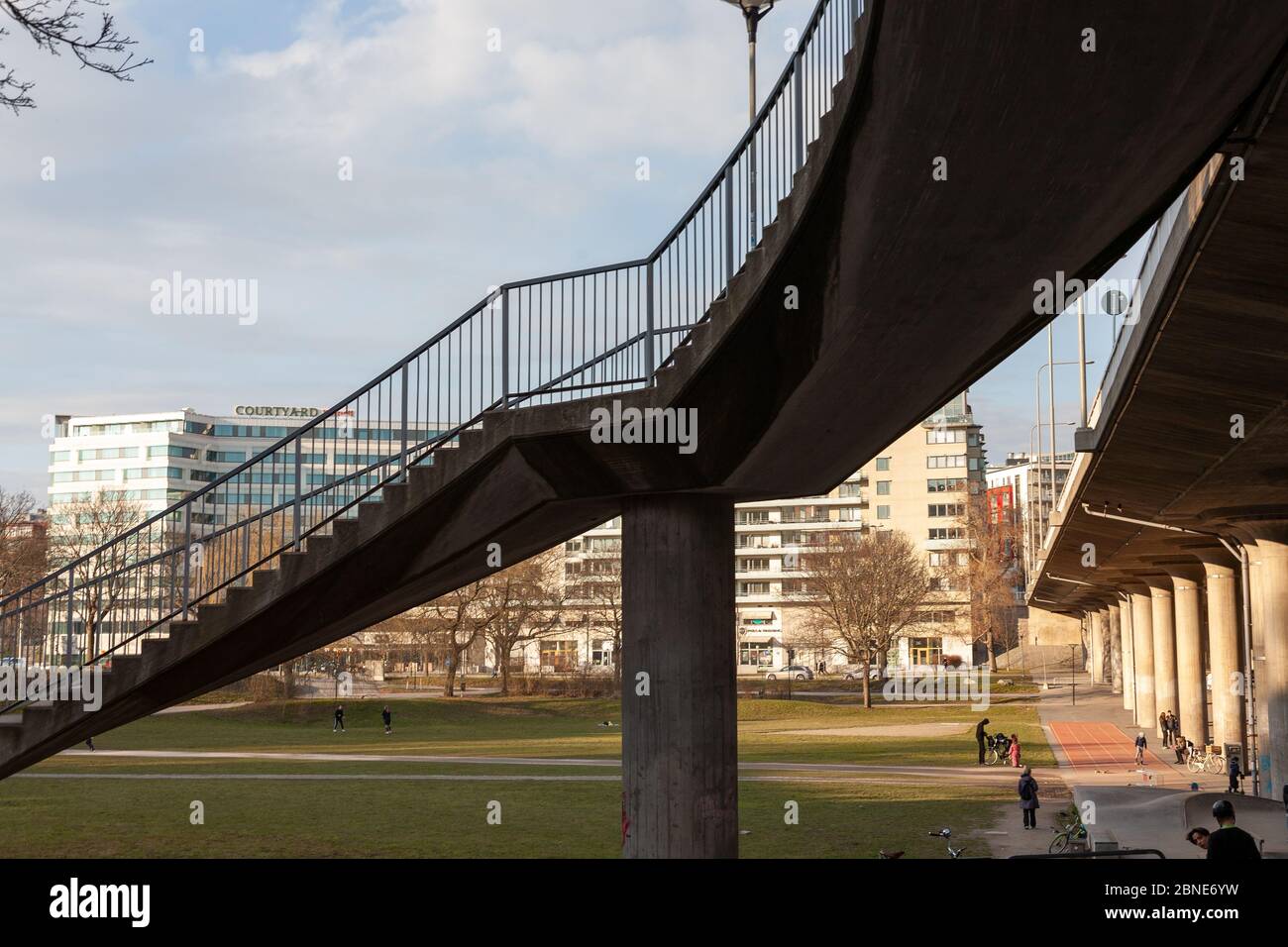 Beautiful shot of bridge stairs with modern buildings in the back Stock ...