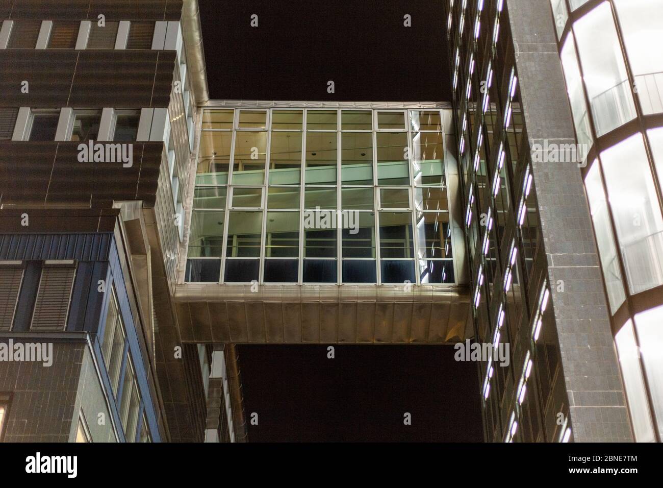 Beautiful shot of a bridge joining two buildings each other Stock Photo ...