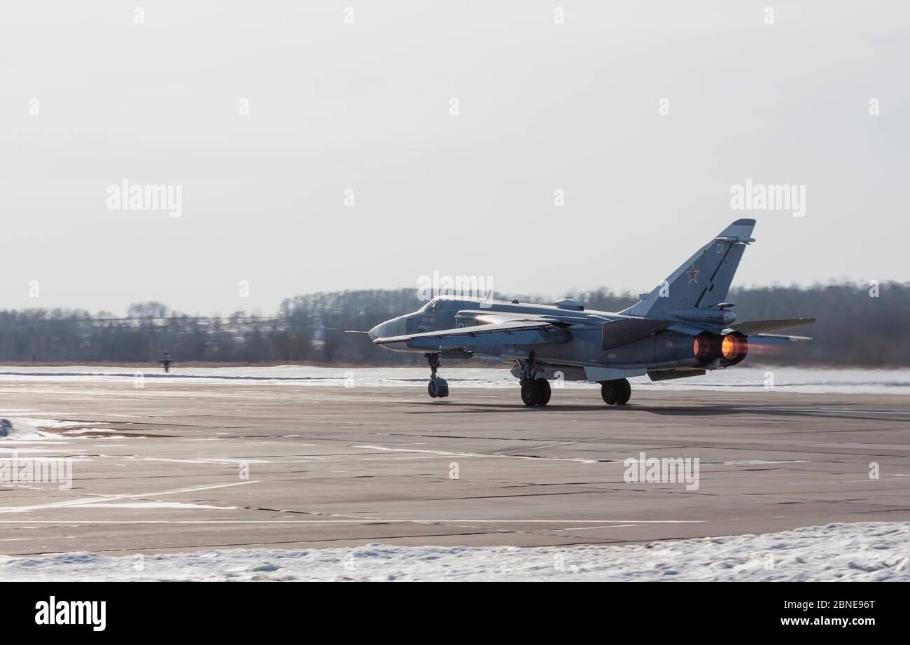 Military jet bomber Su-24 Fencer afterburner takeoff Stock Photo - Alamy