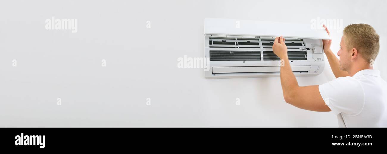 Air Conditioner Installing And Repair Work By Technician Stock Photo ...