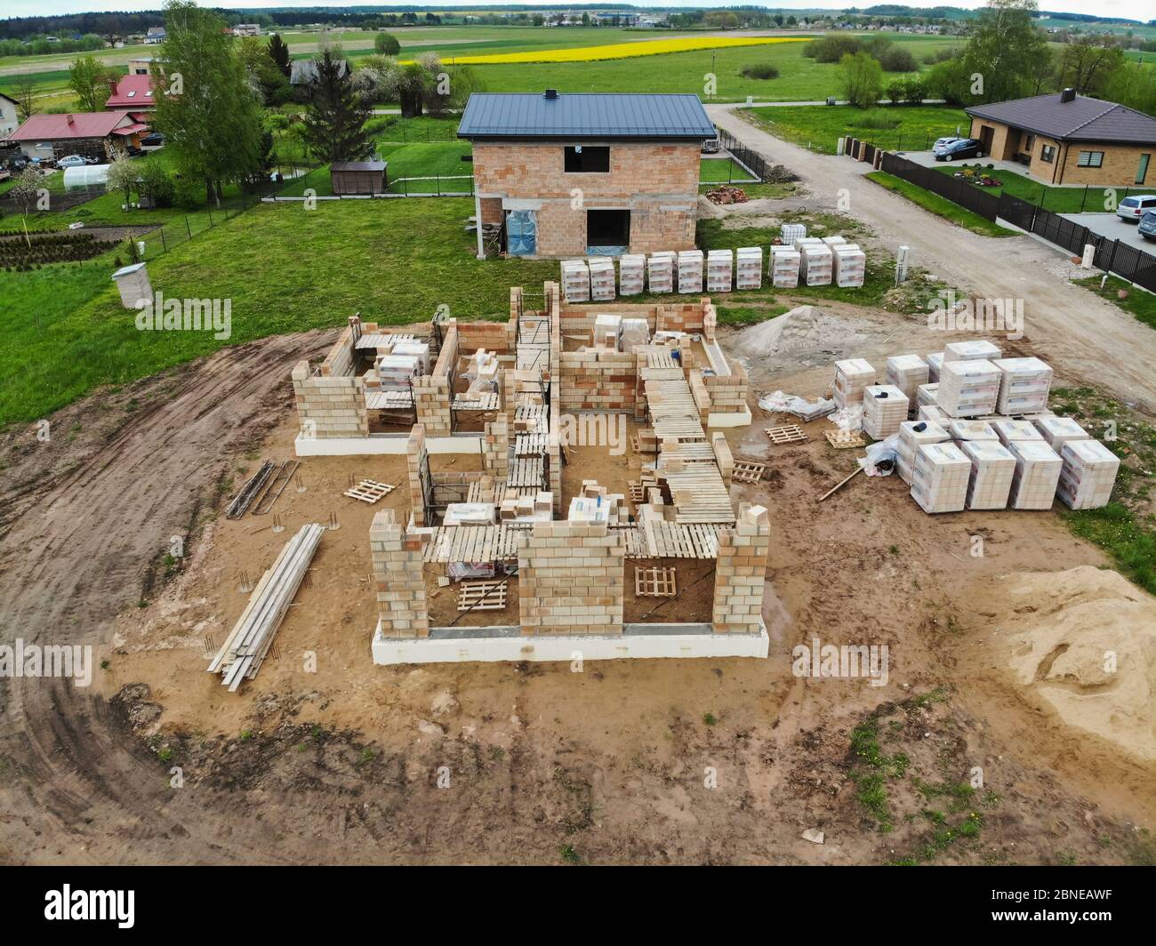 Brickwork in progress at the construction site. Ceramic block house ...
