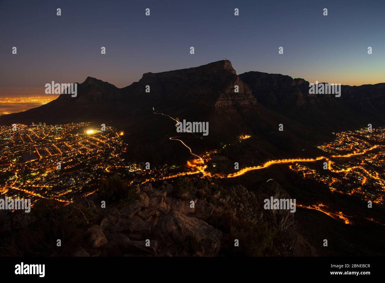 Table Mountain and the City of Cape Town, seen at night from Lions Head ...