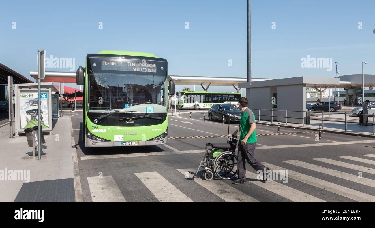 Lisbon, Portugal - May 11, 2018: Shuttle parked in front of Terminal 2 ...