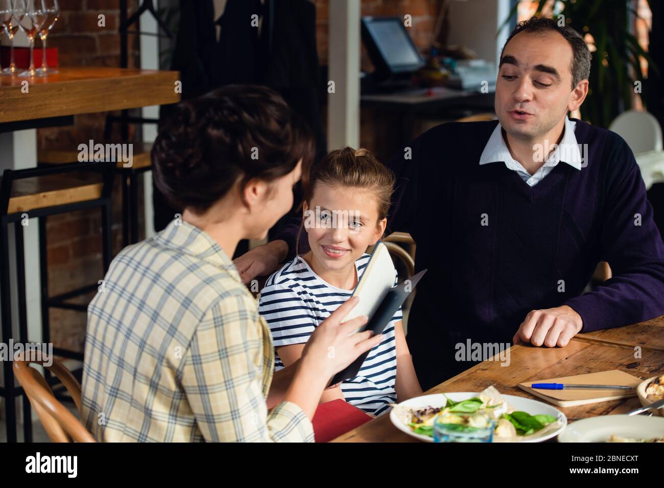 Large family dinner vintage hi-res stock photography and images - Alamy