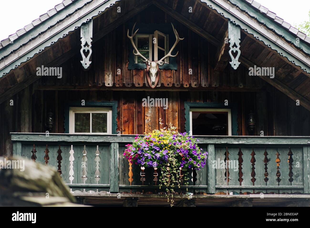 photo of a country wooden house in nature Stock Photo - Alamy