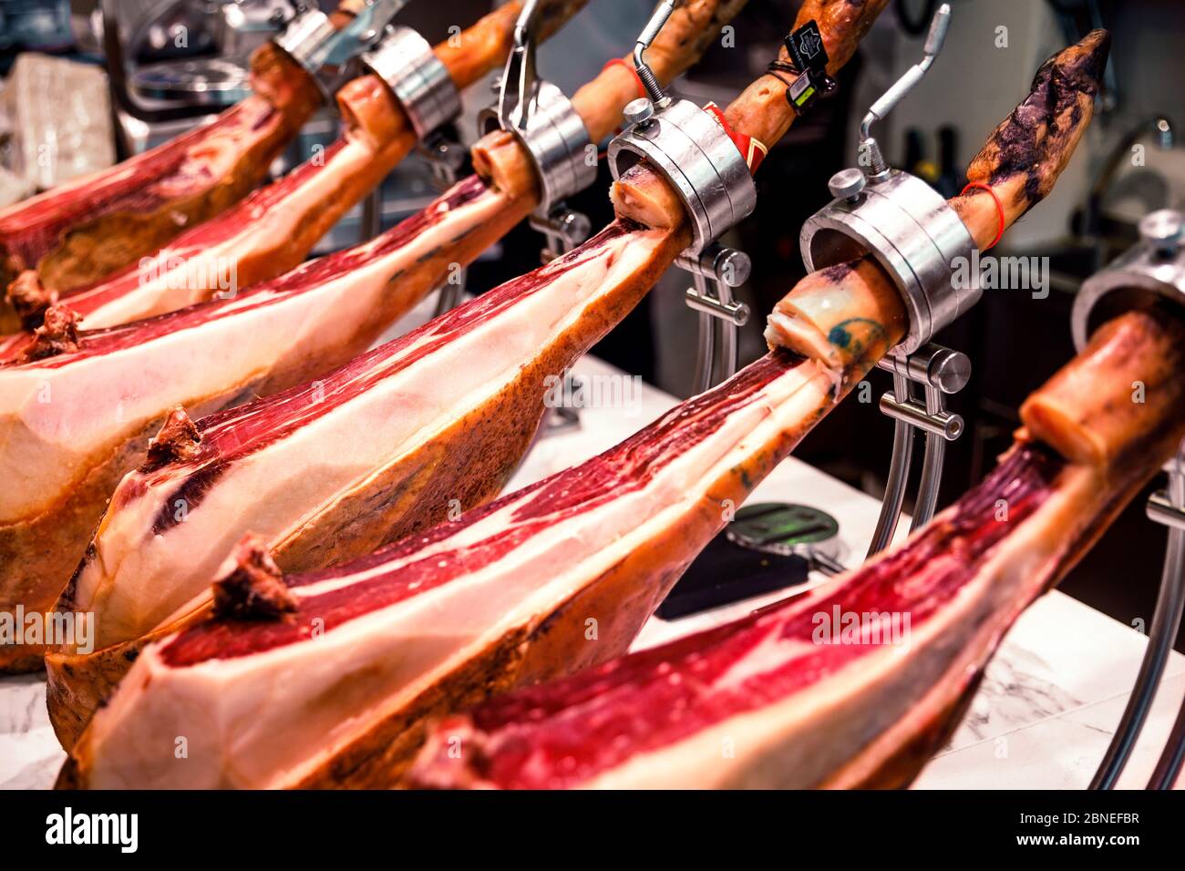 Famous ripened Spanish iberico ham in the Barcelona market Stock Photo ...