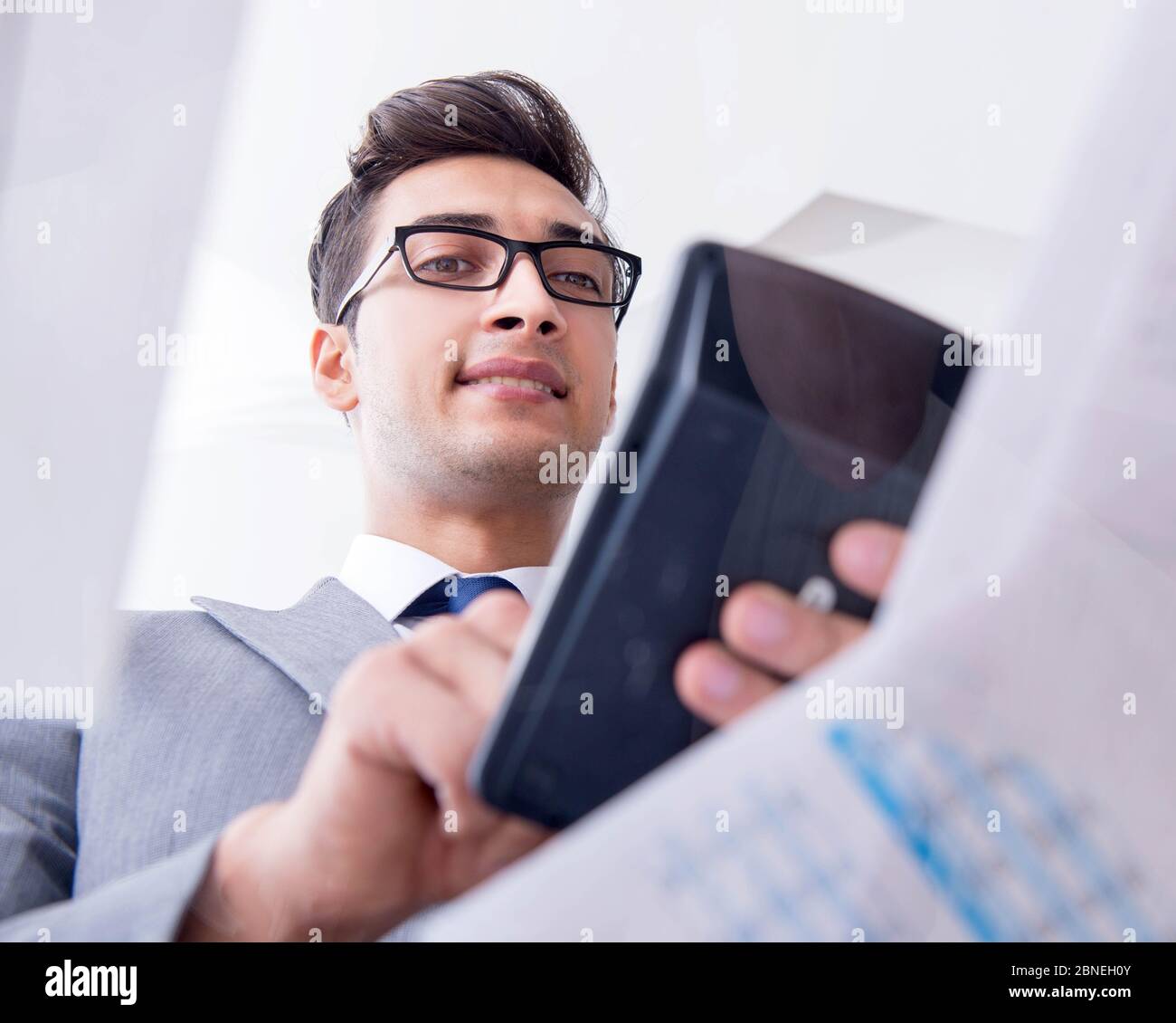 The businessman looking at financial charts and graphs Stock Photo - Alamy