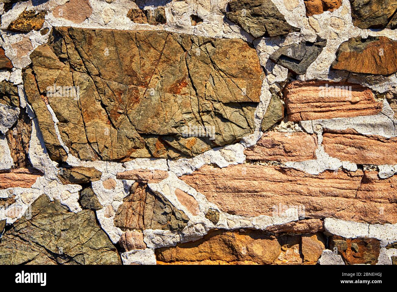 Large natural stone in a wall as a stone texture background Stock Photo ...