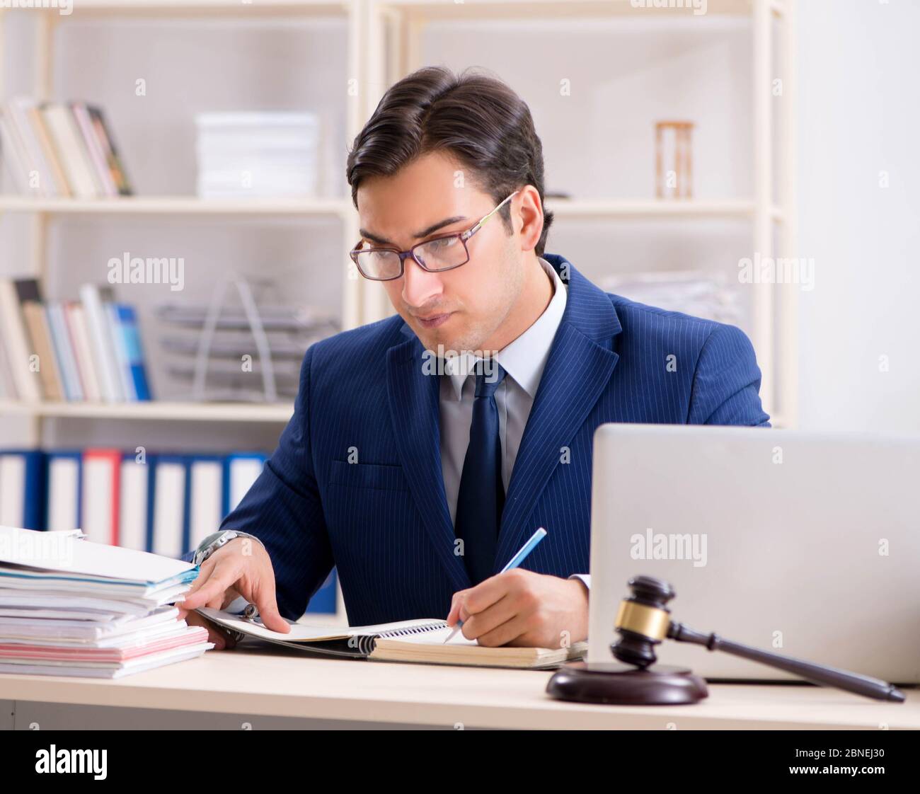 The young handsome judge working in court Stock Photo - Alamy