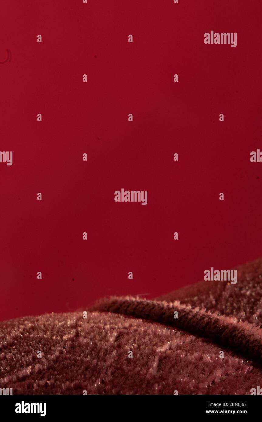 red upholstery chair fabric cushion texture background Stock Photo - Alamy