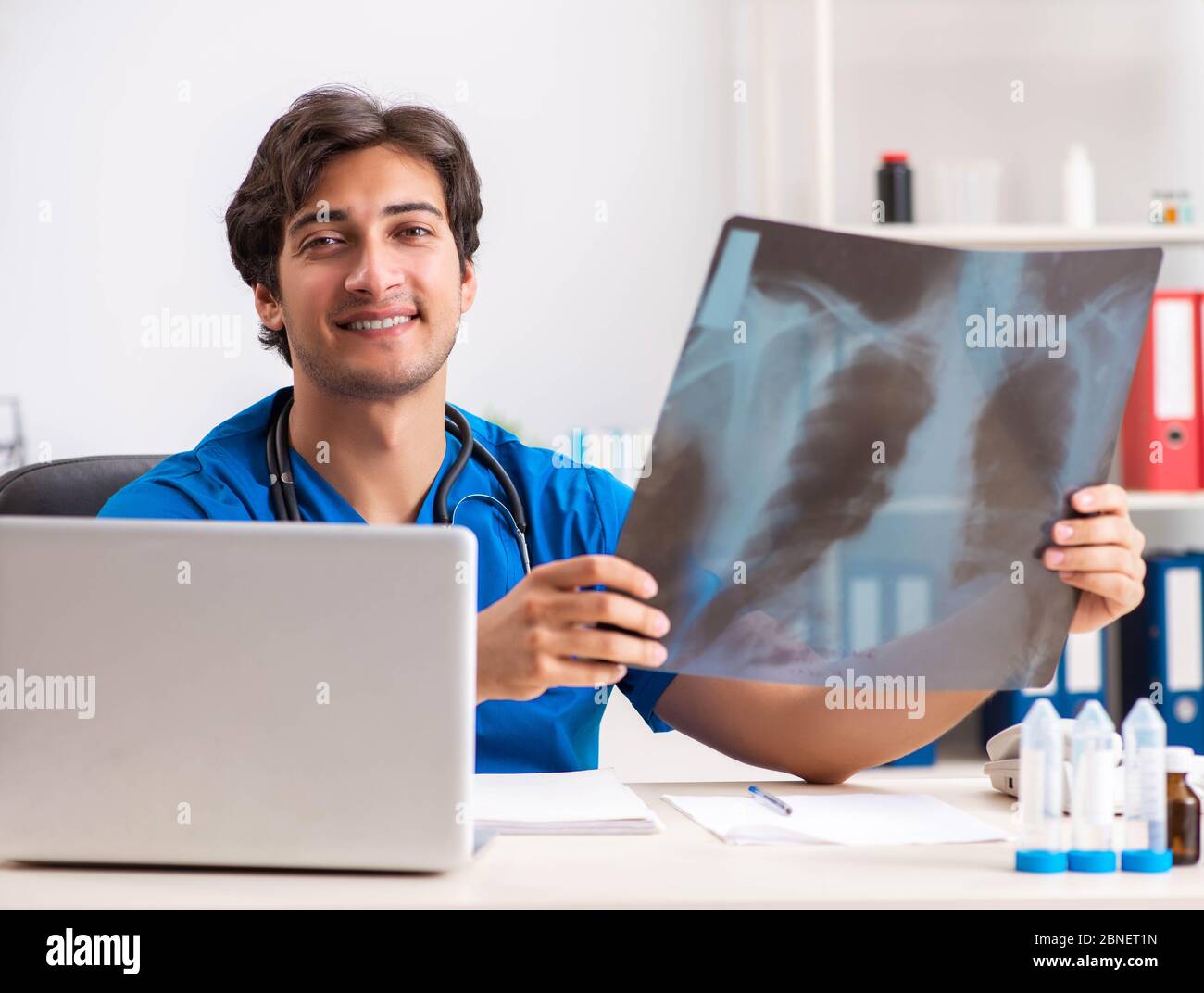 The male doctor radiologist with x-ray can image Stock Photo - Alamy