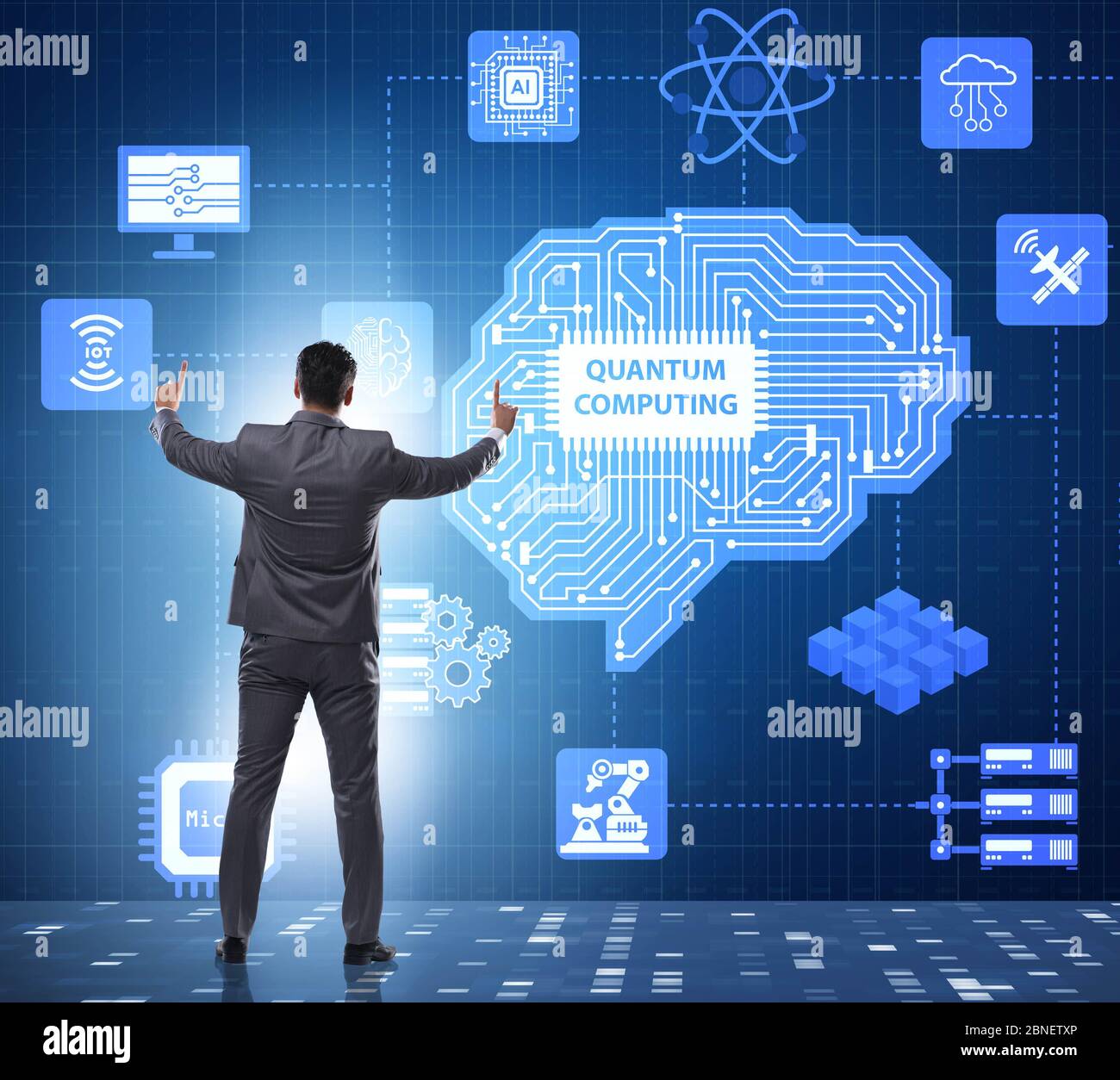 The businessman pressing virtual button in quantum computing concept ...