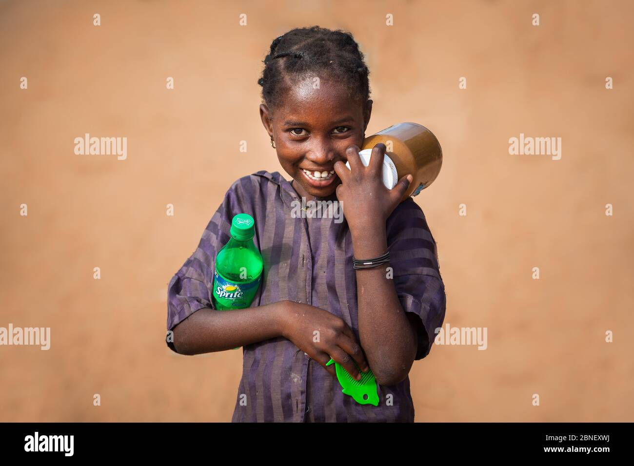 young African smiling girl portrait Stock Photo - Alamy
