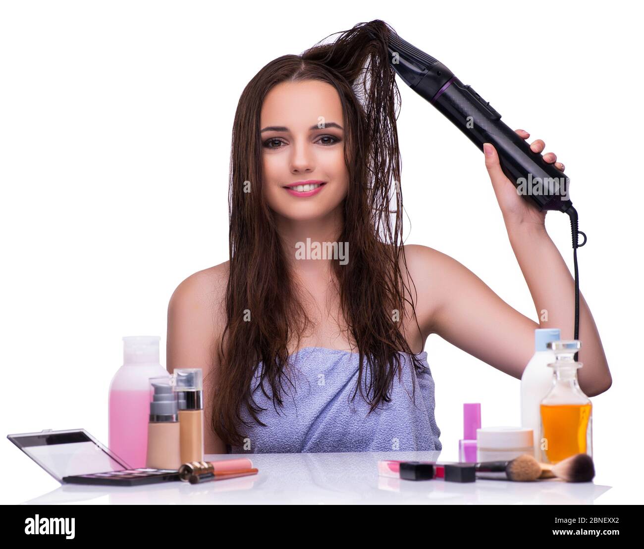 The woman doing hair isolated on white Stock Photo - Alamy