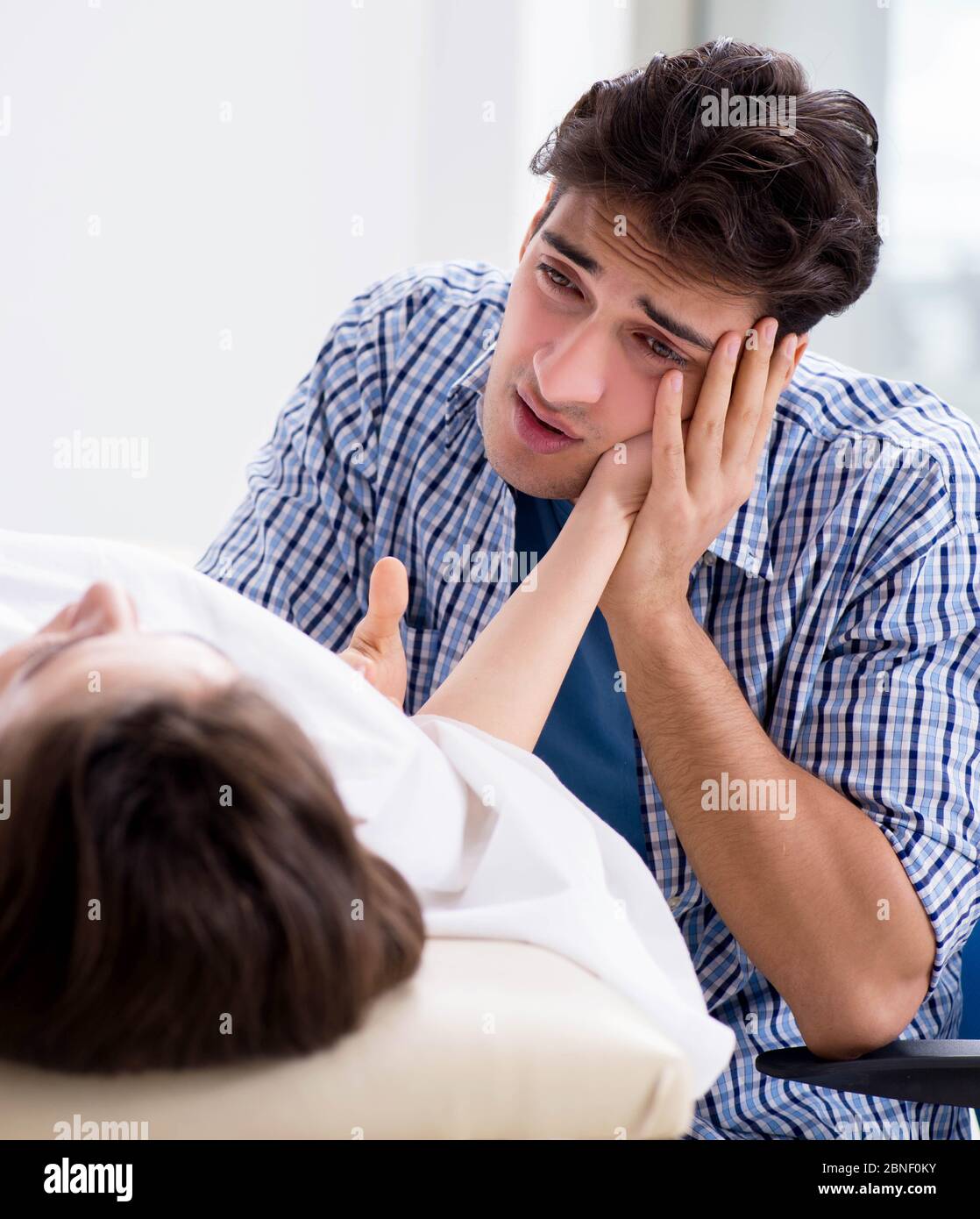 The man mourning his dead wife Stock Photo - Alamy