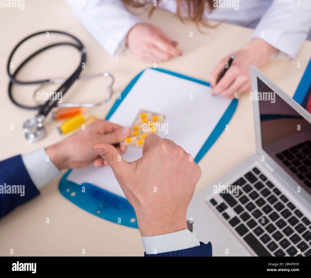 The man visiting doctor for routine check-up Stock Photo - Alamy