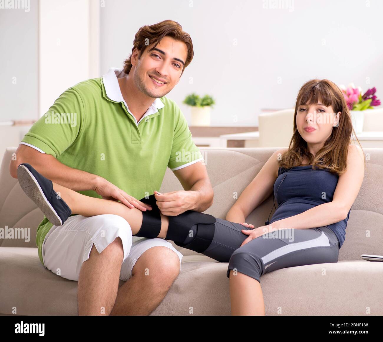 The concept of knee sports injury Stock Photo - Alamy