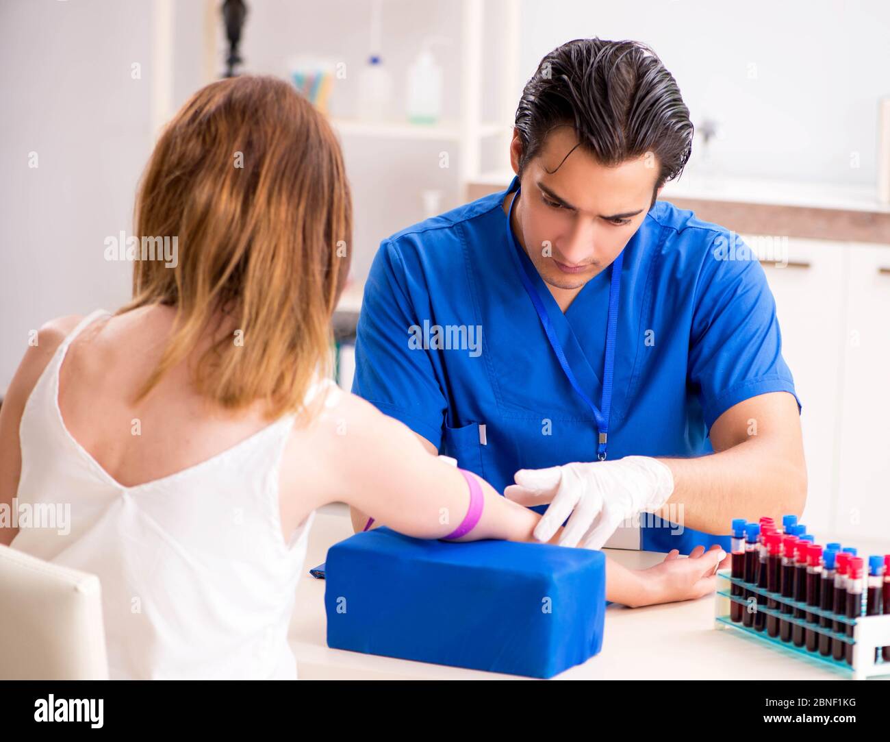 The young patient during blood test sampling procedure Stock Photo - Alamy