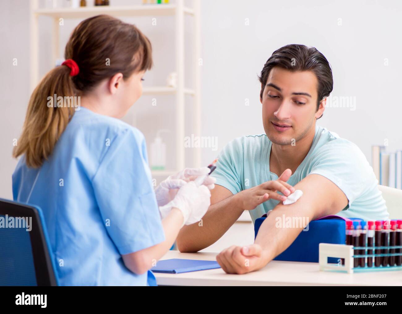 The young patient during blood test sampling procedure Stock Photo - Alamy