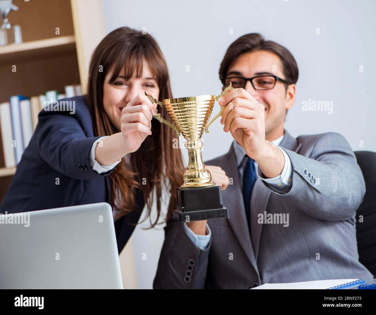 The concept of teamwork with prize Stock Photo - Alamy