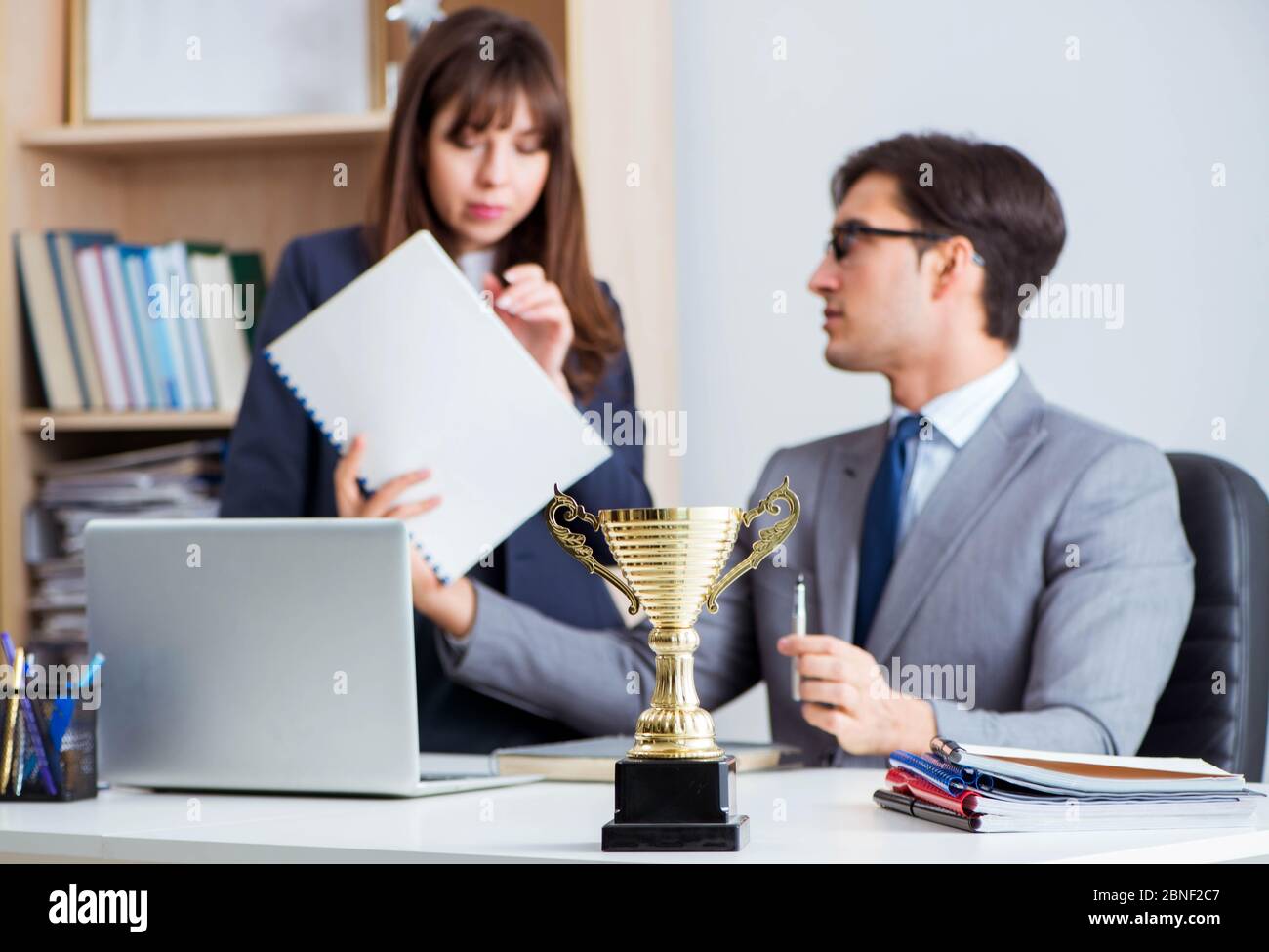 The concept of teamwork with prize Stock Photo - Alamy