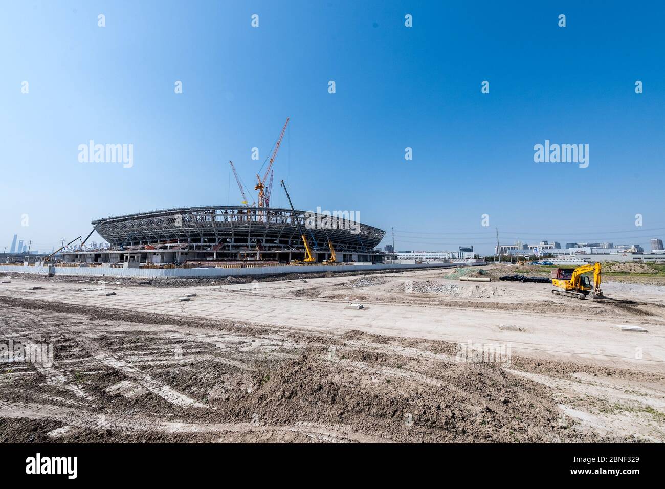 Workers are busy at constructing the Pudong Football Stadium, which ...
