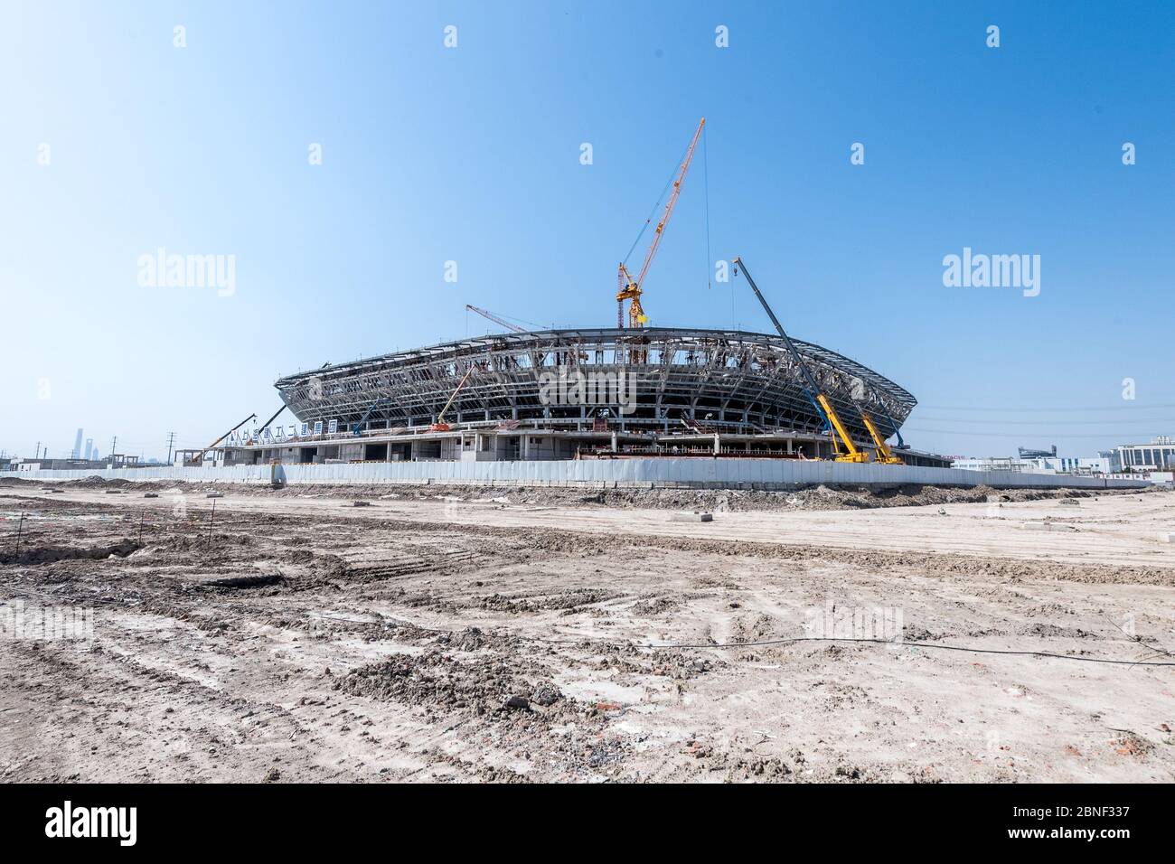 Workers are busy at constructing the Pudong Football Stadium, which ...