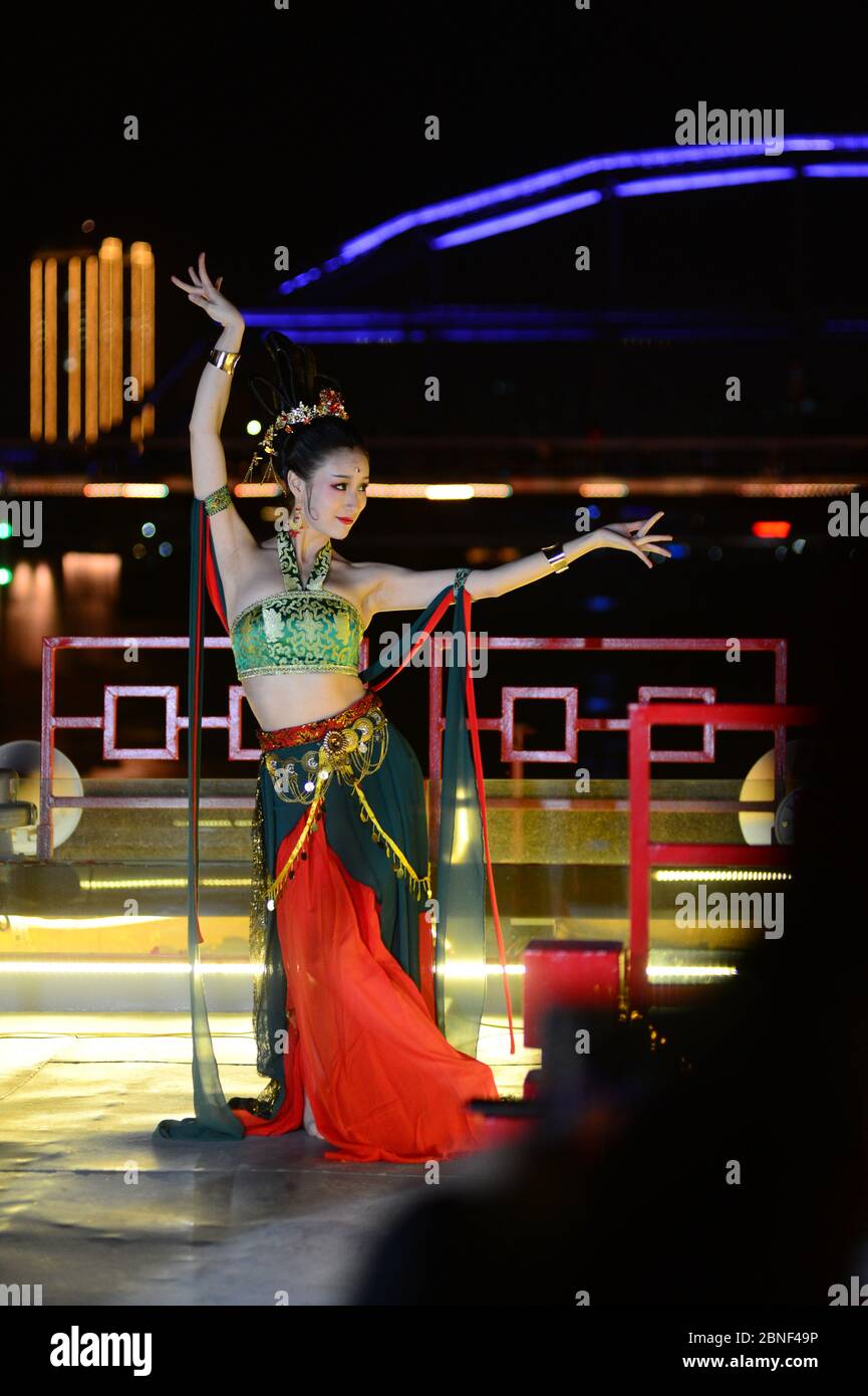 A performer plays Dunhuang Flying Apsaras Dance, which drew inspiration ...