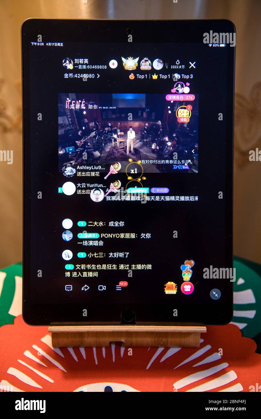 In this unlocated photo, a fan watches a livestream concert of Chinese ...