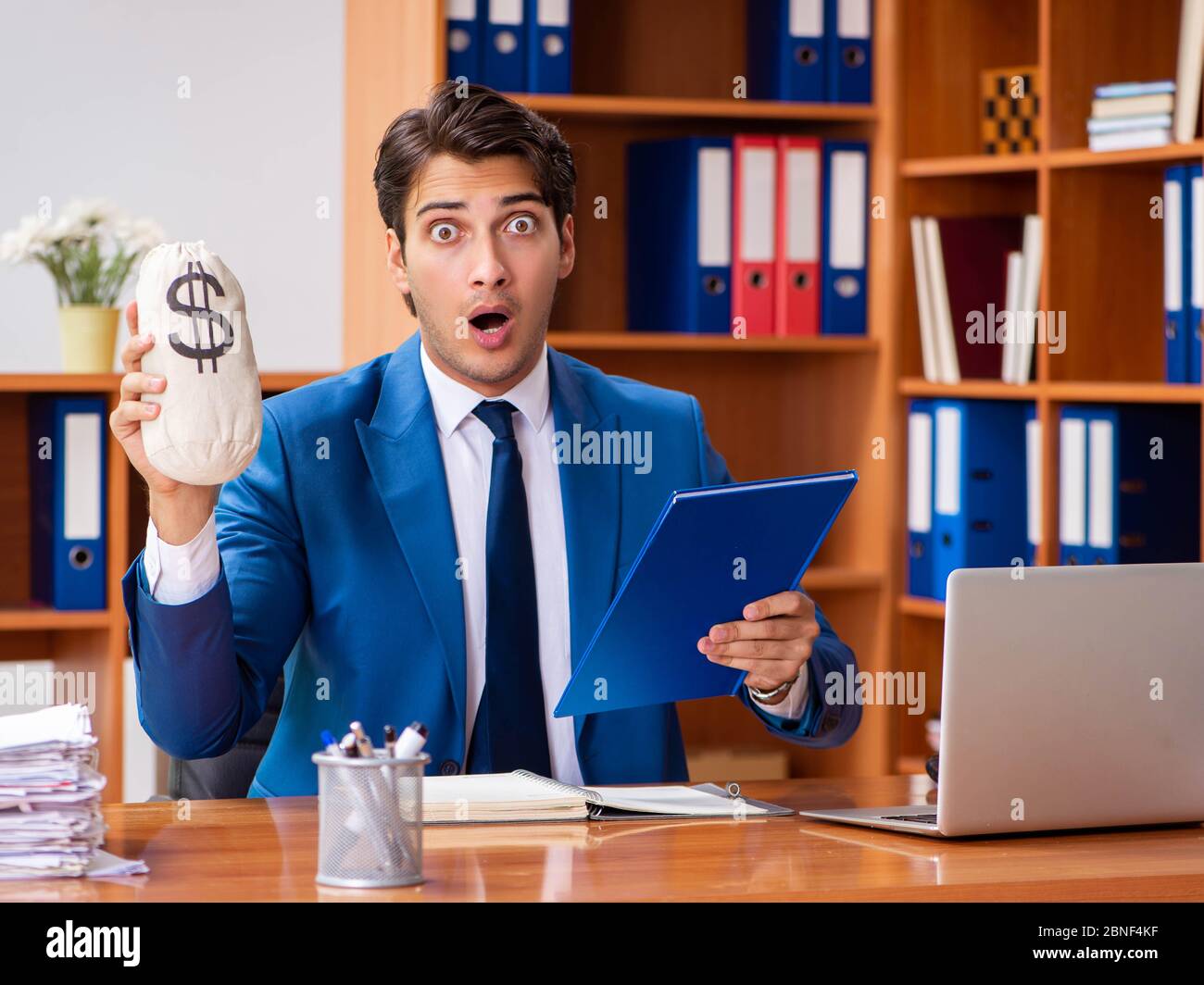 Shocked successful employee young hi-res stock photography and images ...