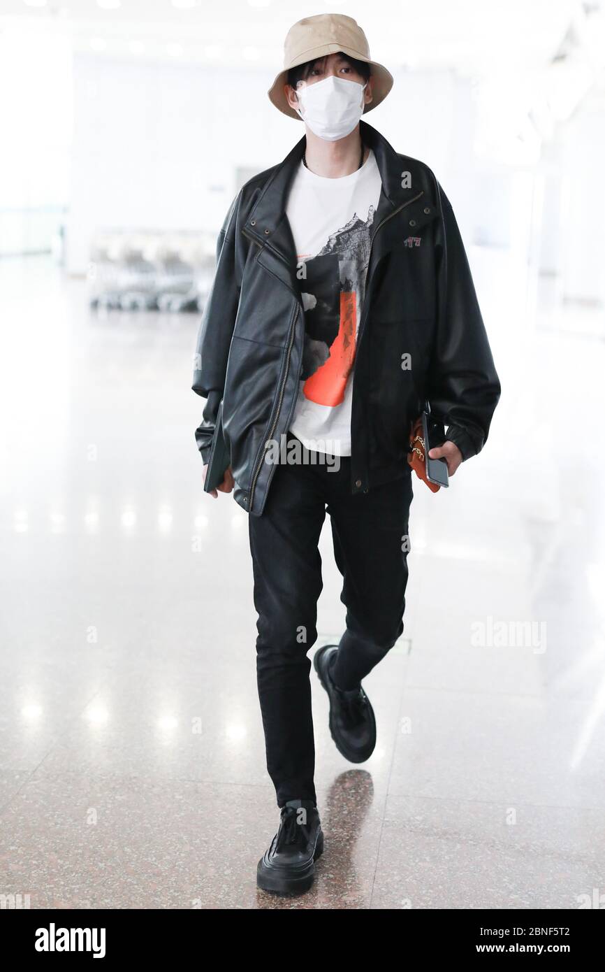 Chinese actor Zhang Yunlong, also kown as Leon Zhang, arrives in an airport in Beijing, China ...