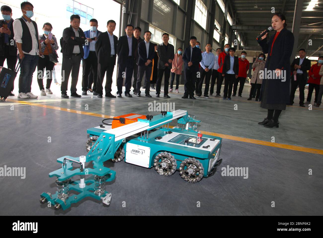 5G robots of various usages demonstrate their functions during the ...