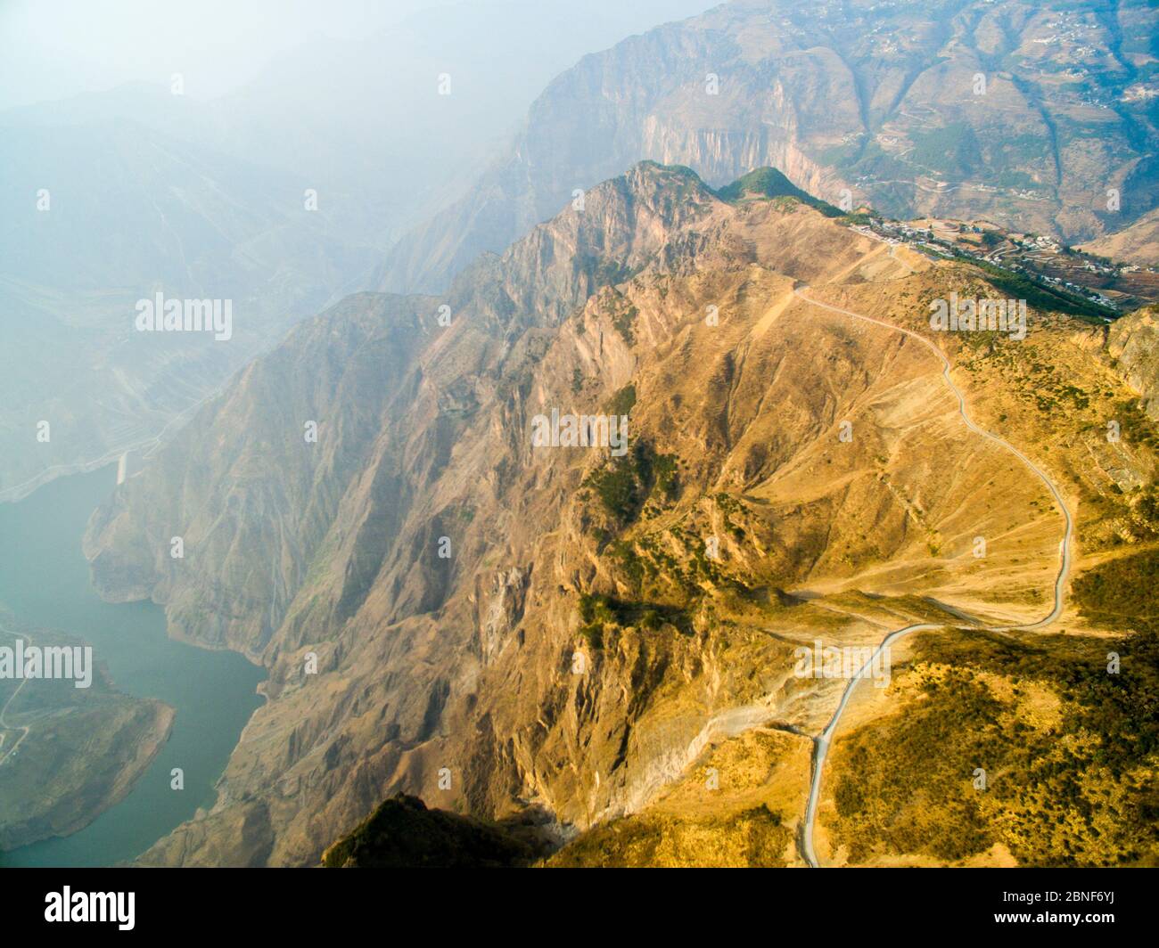 Aerial view of the zigzag mountain road in Xueshan Village in Kunming ...
