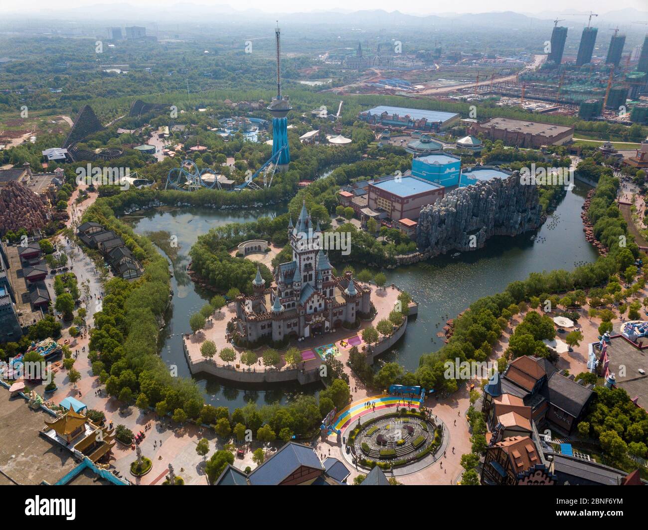 An aerial view of the parking lot of Fantawild Adventure, a Chinese ...