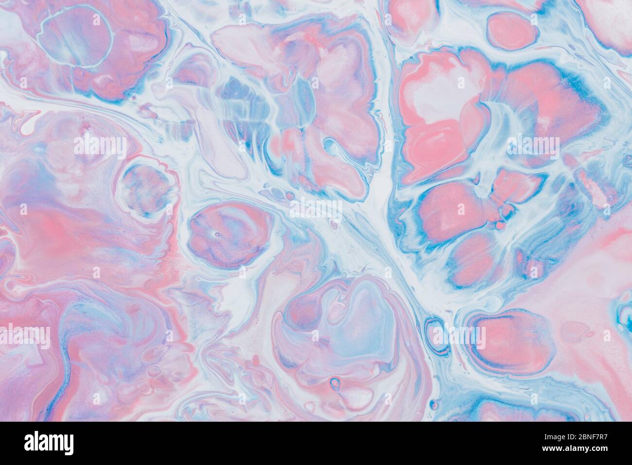 A beautiful calming background in oily blue and pink pastel colors ...