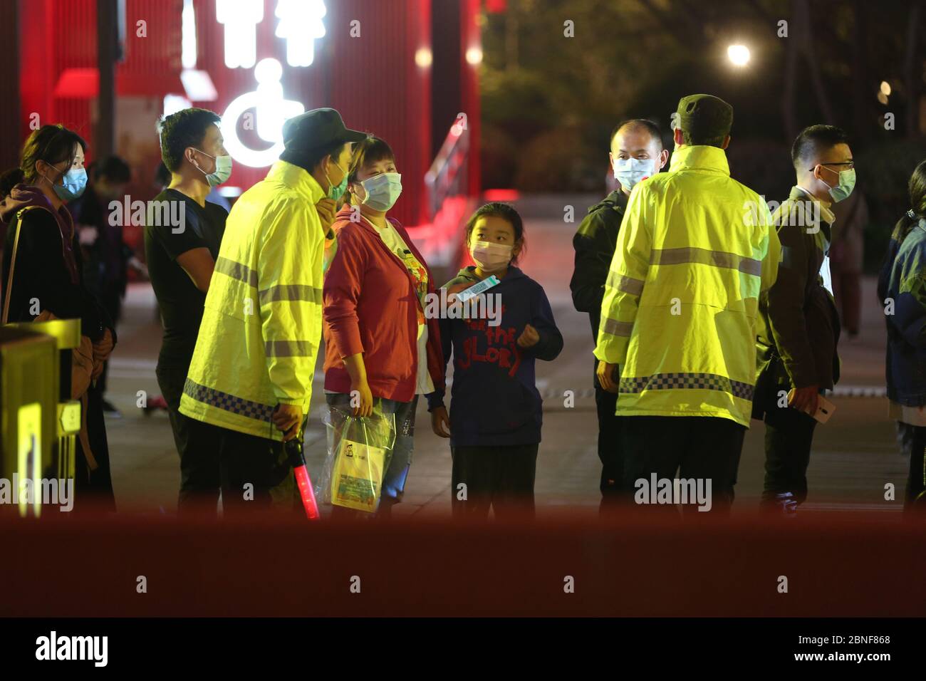 Tourists with face mask on at Grand Tang Dynasty Ever Bright City, a ...