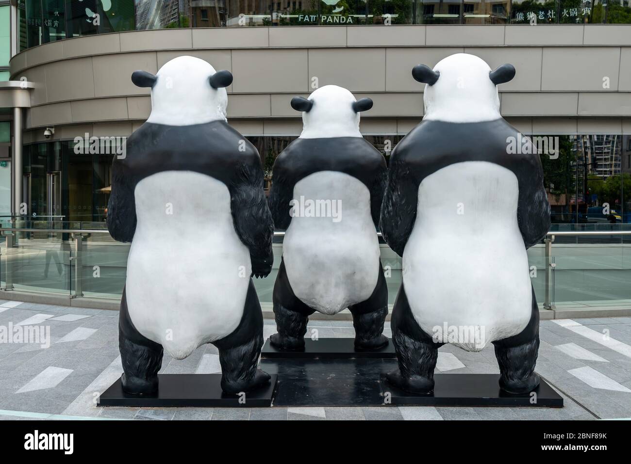 Three panda sculptures are captured on a street in Hongkou district in ...