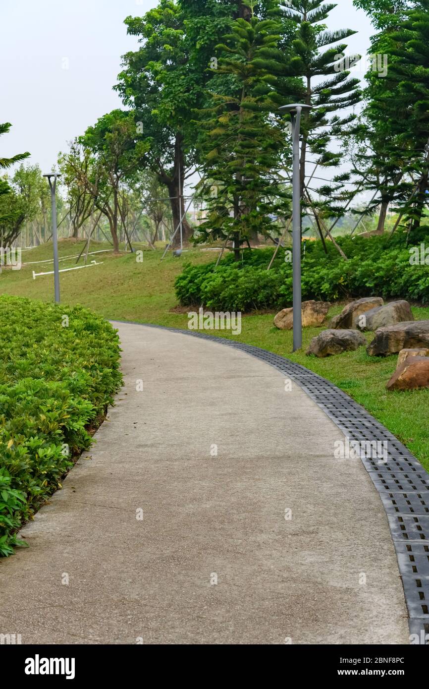 curved outdoor pathway in a park Stock Photo - Alamy