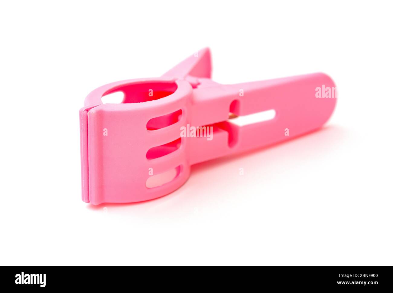 pink clothespin on a white background Stock Photo - Alamy