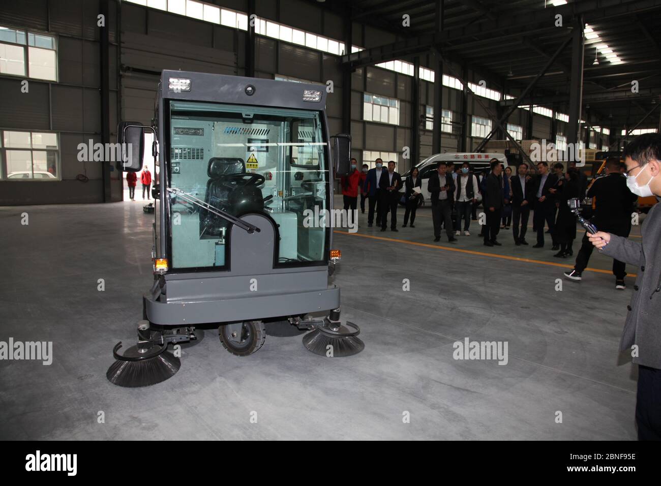 5G robots of various usages demonstrate their functions during the ...