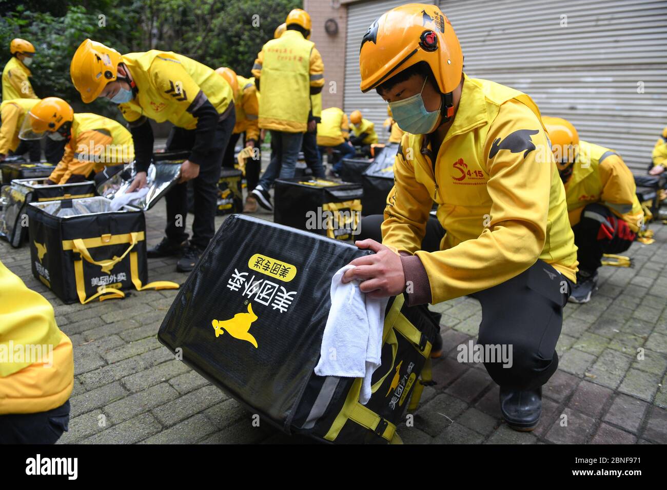 At a site of Meituan Food Delivery, deliverymen are taking everyday's ...