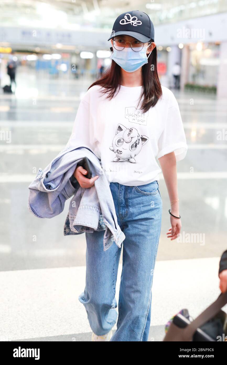 Chinese actress Chen Yuqi or Yukee Chen arrives at a Beijing airport ...