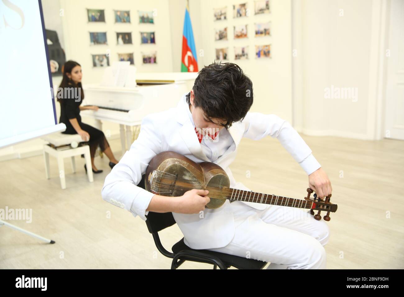 Tar string instrument . Man playing on a classical folk instrument tar ...