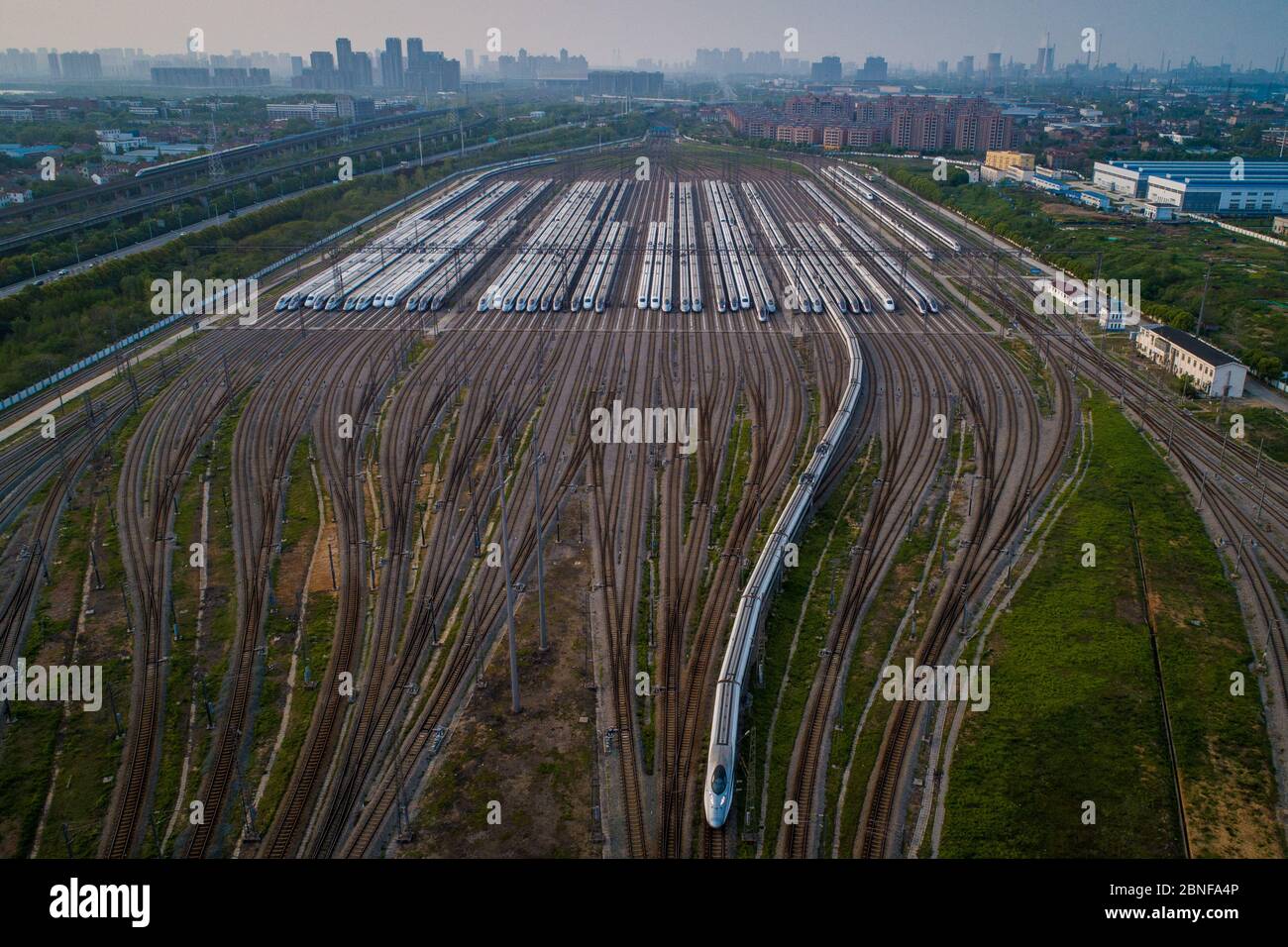 Aerial view of Hundreds of high-speed trains standing in line at Wuhan ...