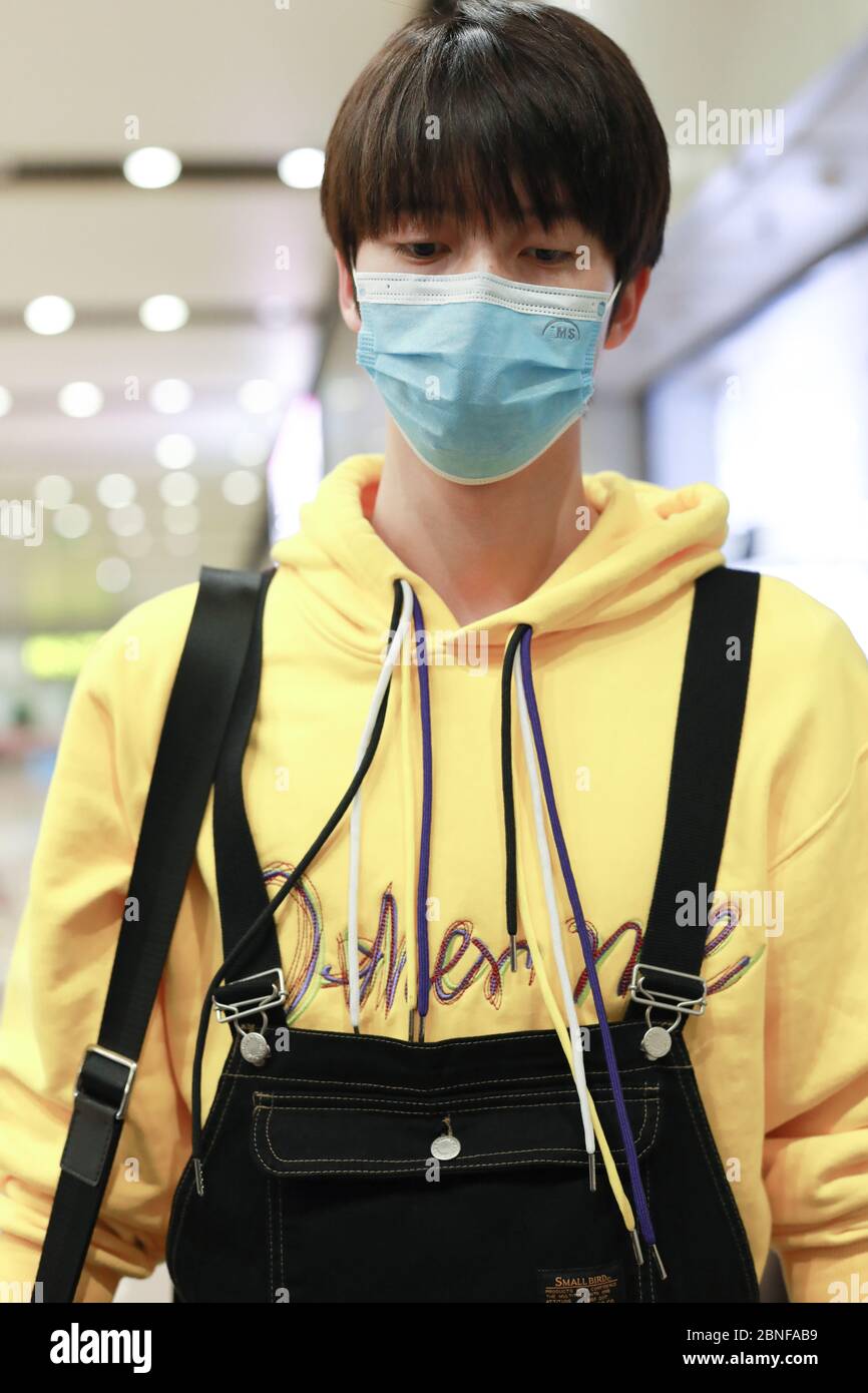 Chinese singer and actor Chen Youwei arrives at a Beijing airport ...
