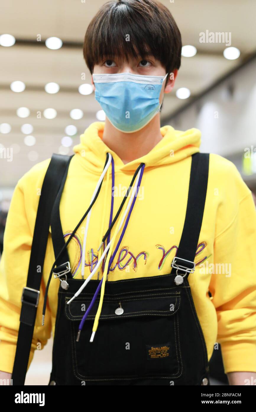 Chinese singer and actor Chen Youwei arrives at a Beijing airport ...