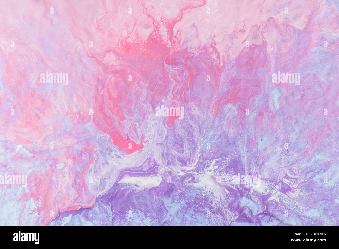 A beautiful calming background in oily pink and purple pastel colour ...